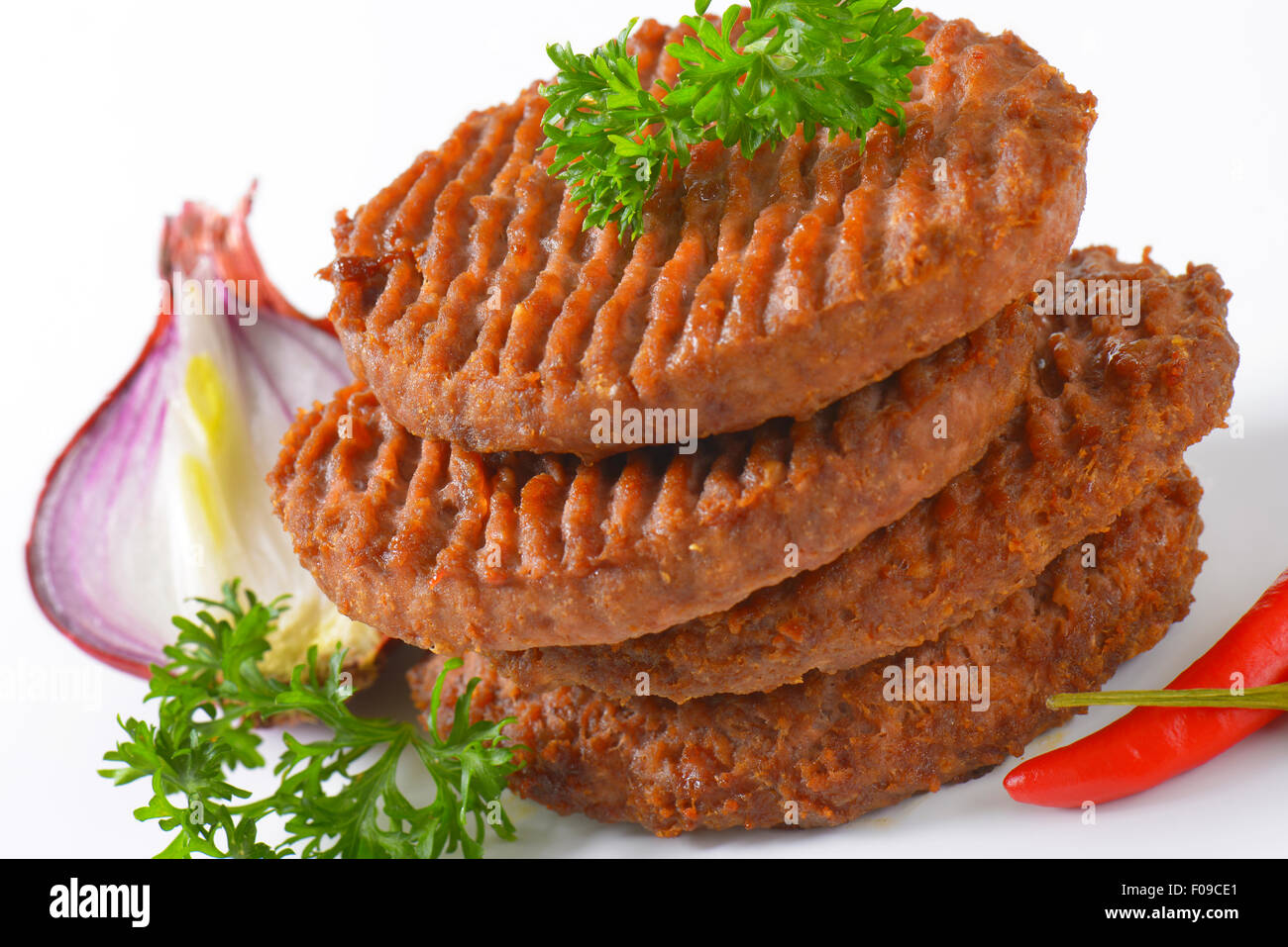 Stack of Grilled Beef Burger Patties Stock Photo - Alamy