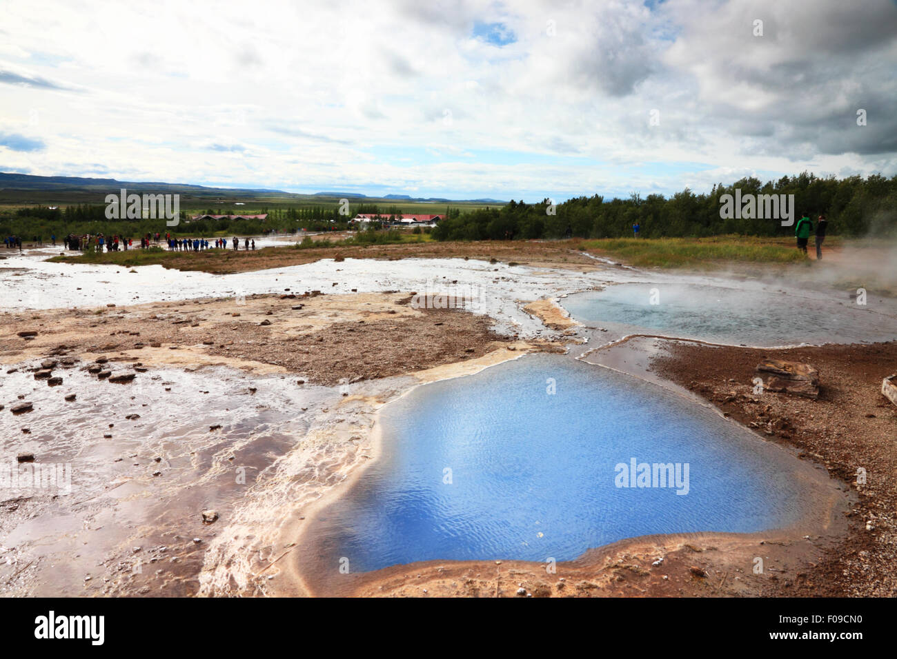 Two hot water pools amid a volcanic landscape Stock Photo - Alamy