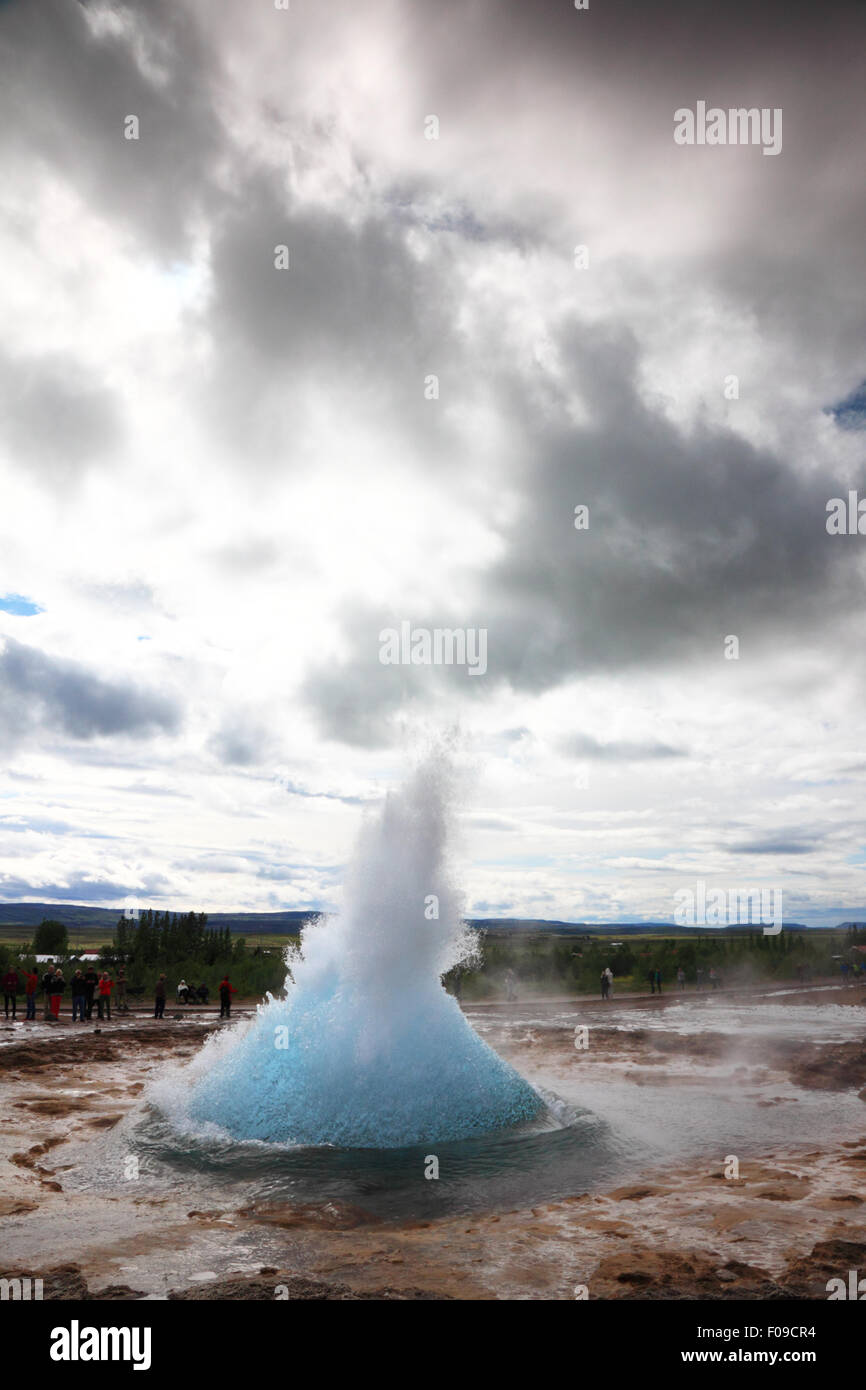 First stage of a water spout eruption amid a volcanic landscape Stock ...