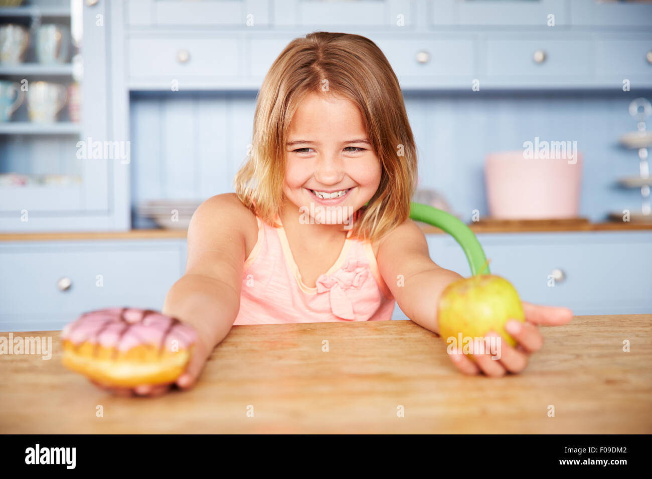 Girl choosing cakes hi-res stock photography and images - Alamy