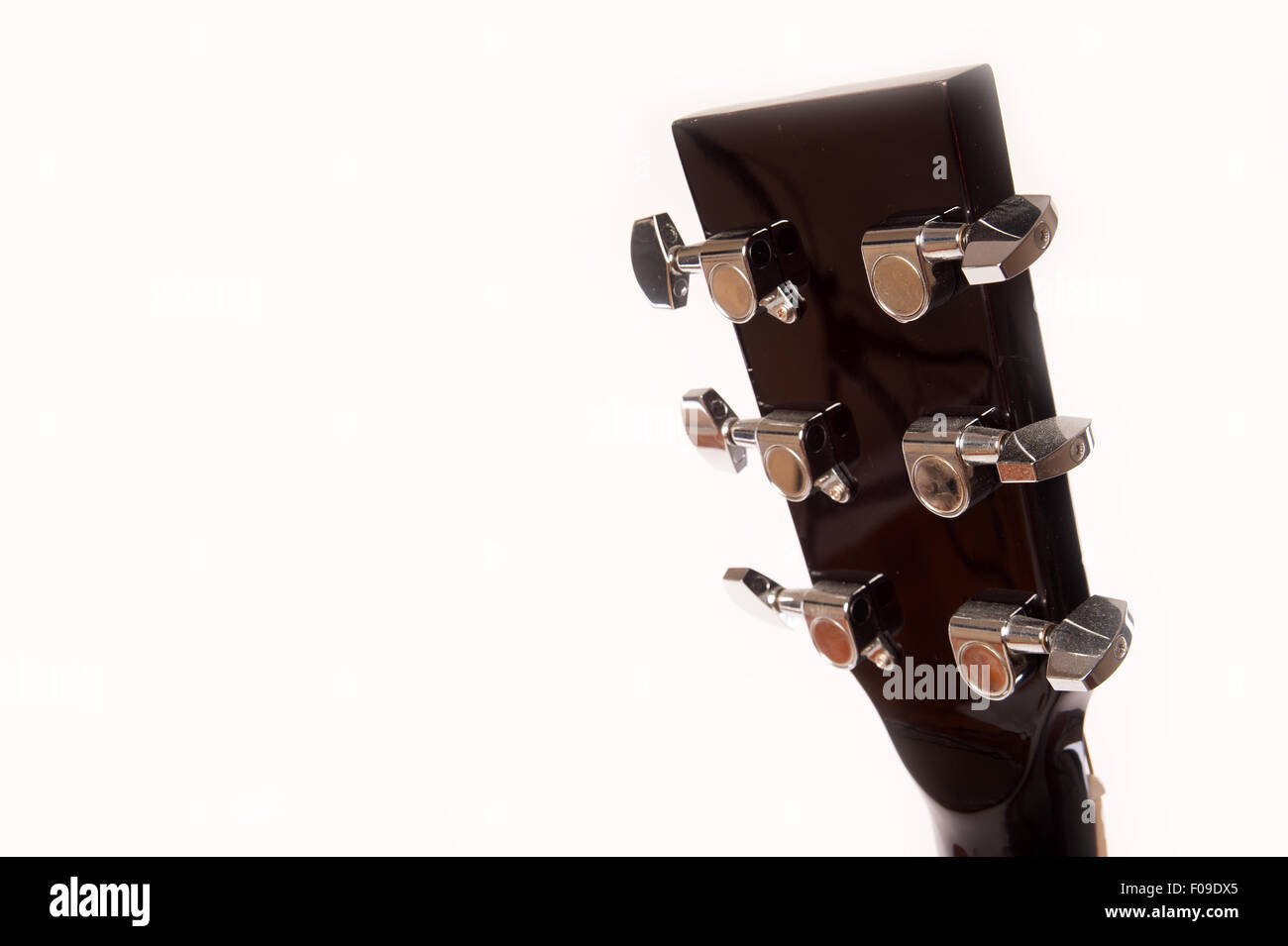 Electric acoustic guitar fretboard close up isolated on white ...