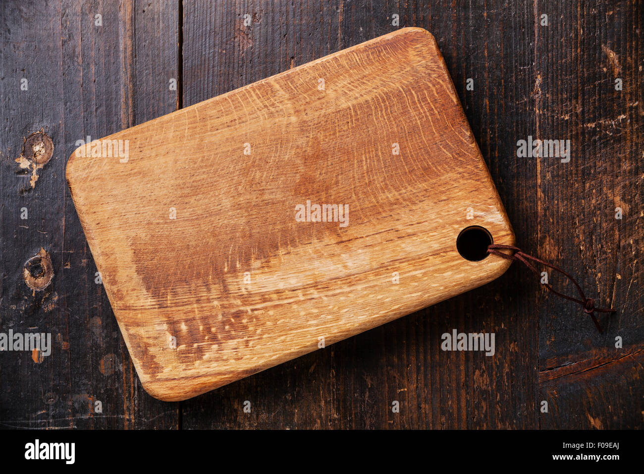 Chopping cutting board on wooden texture background Stock Photo - Alamy