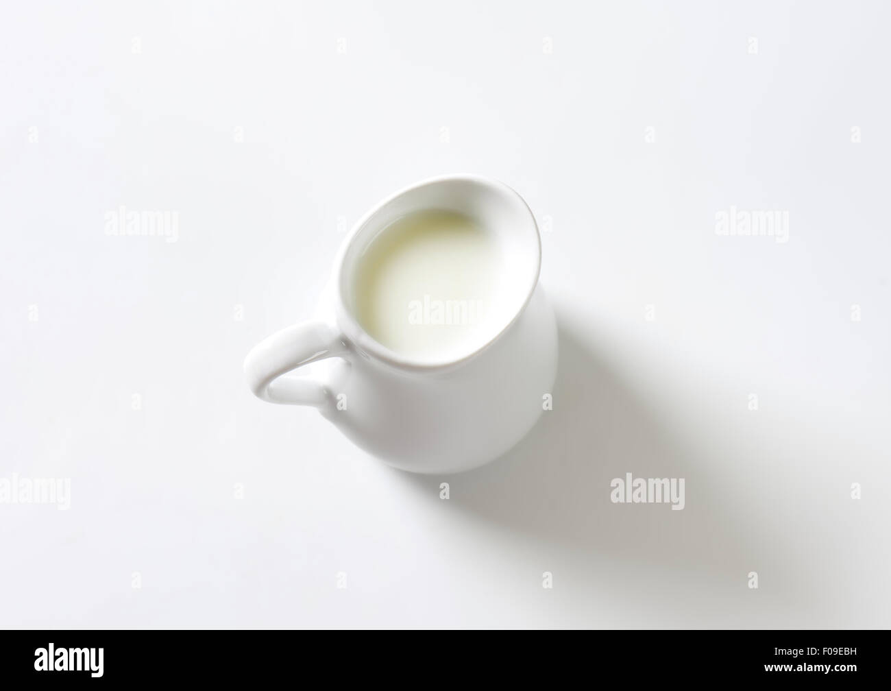 Fresh milk in white pitcher Stock Photo - Alamy