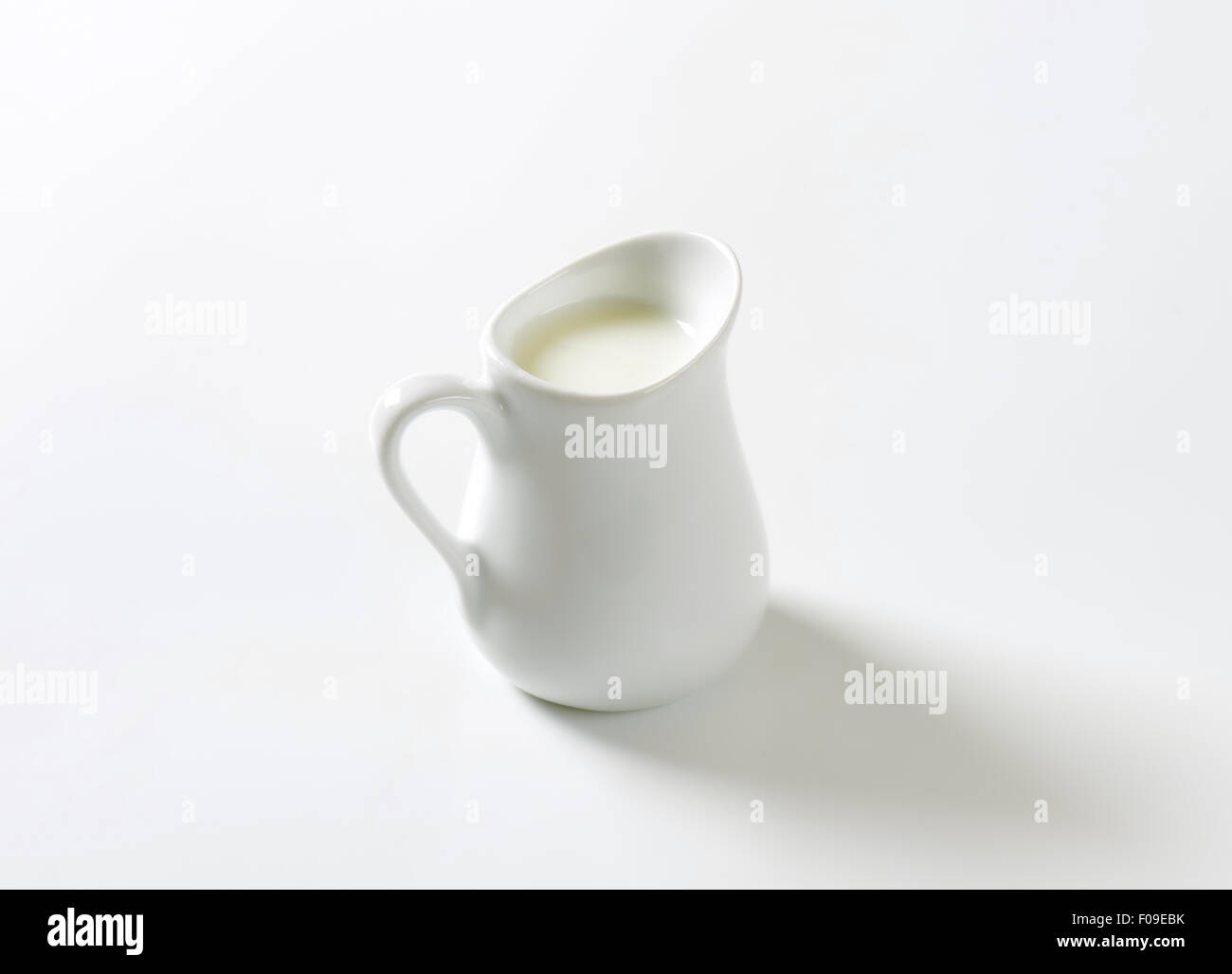 Fresh milk in white pitcher Stock Photo - Alamy