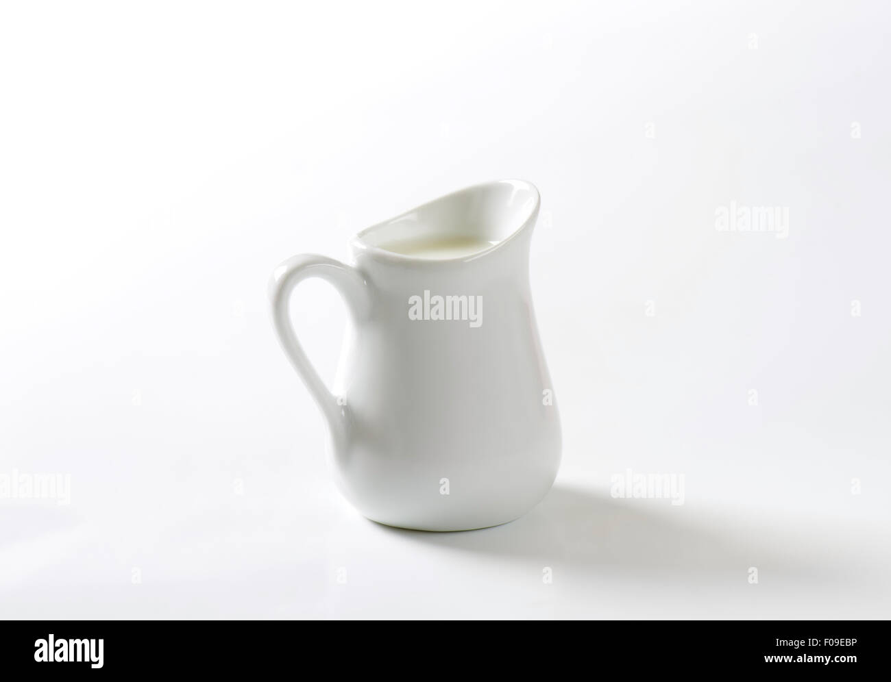Fresh milk in white pitcher Stock Photo - Alamy