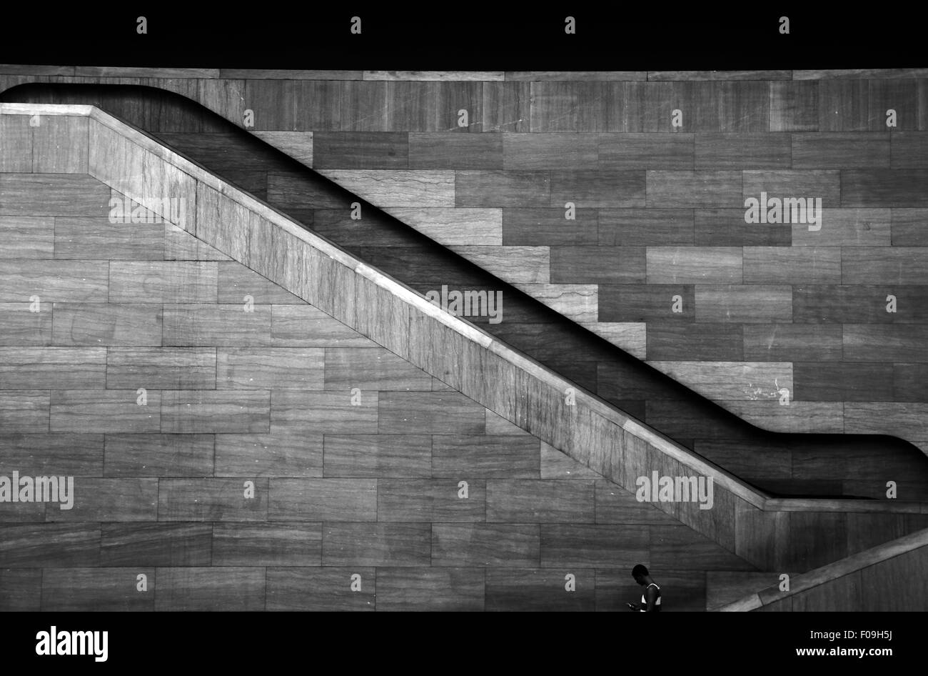 Descending down the wall Stock Photo - Alamy