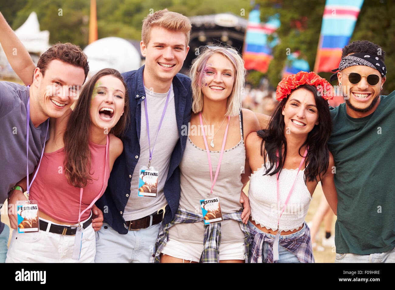 Group of friends hanging out together at a music festival Stock Photo ...