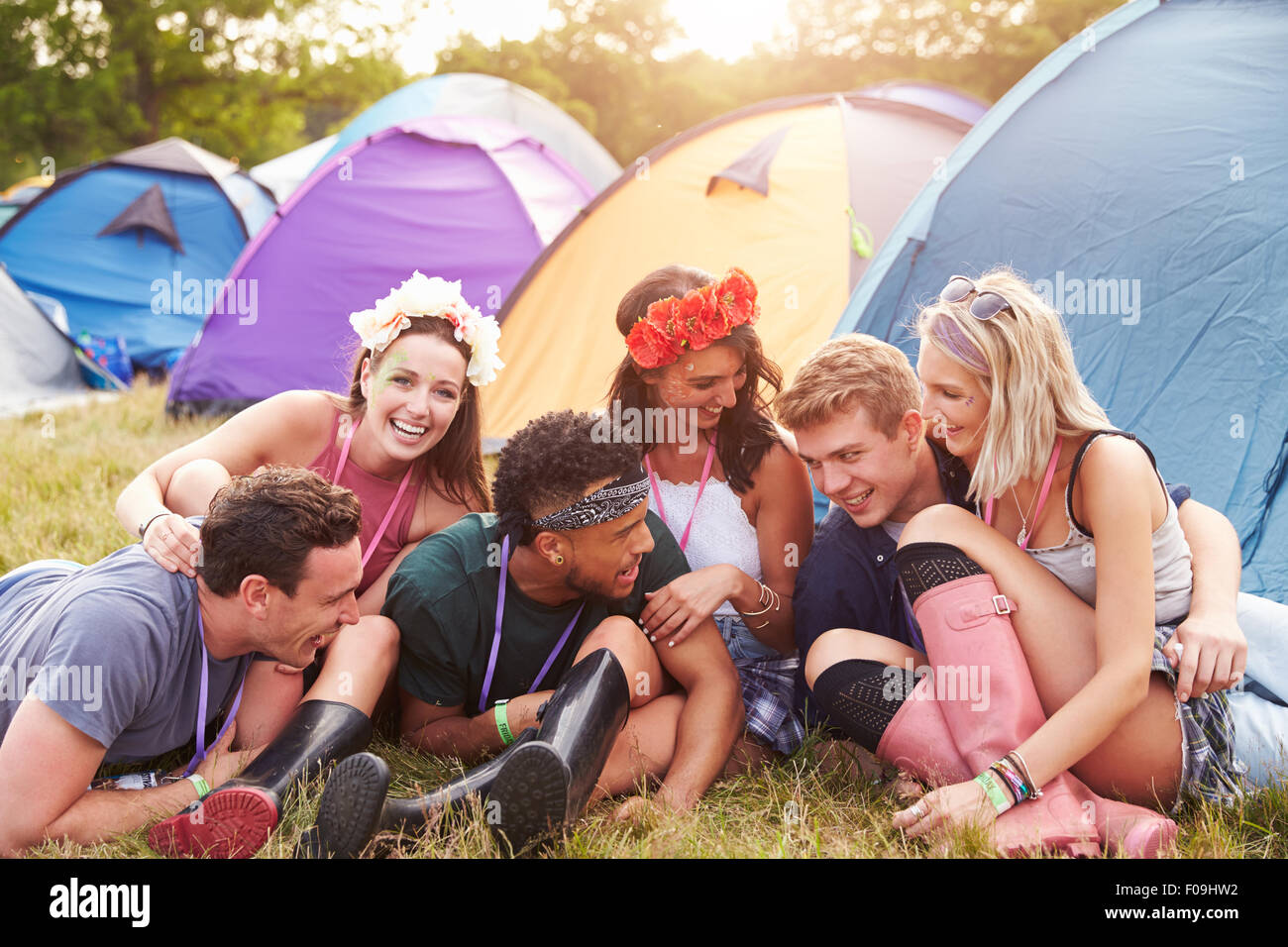 Friends having fun on the campsite at a music festival Stock Photo - Alamy