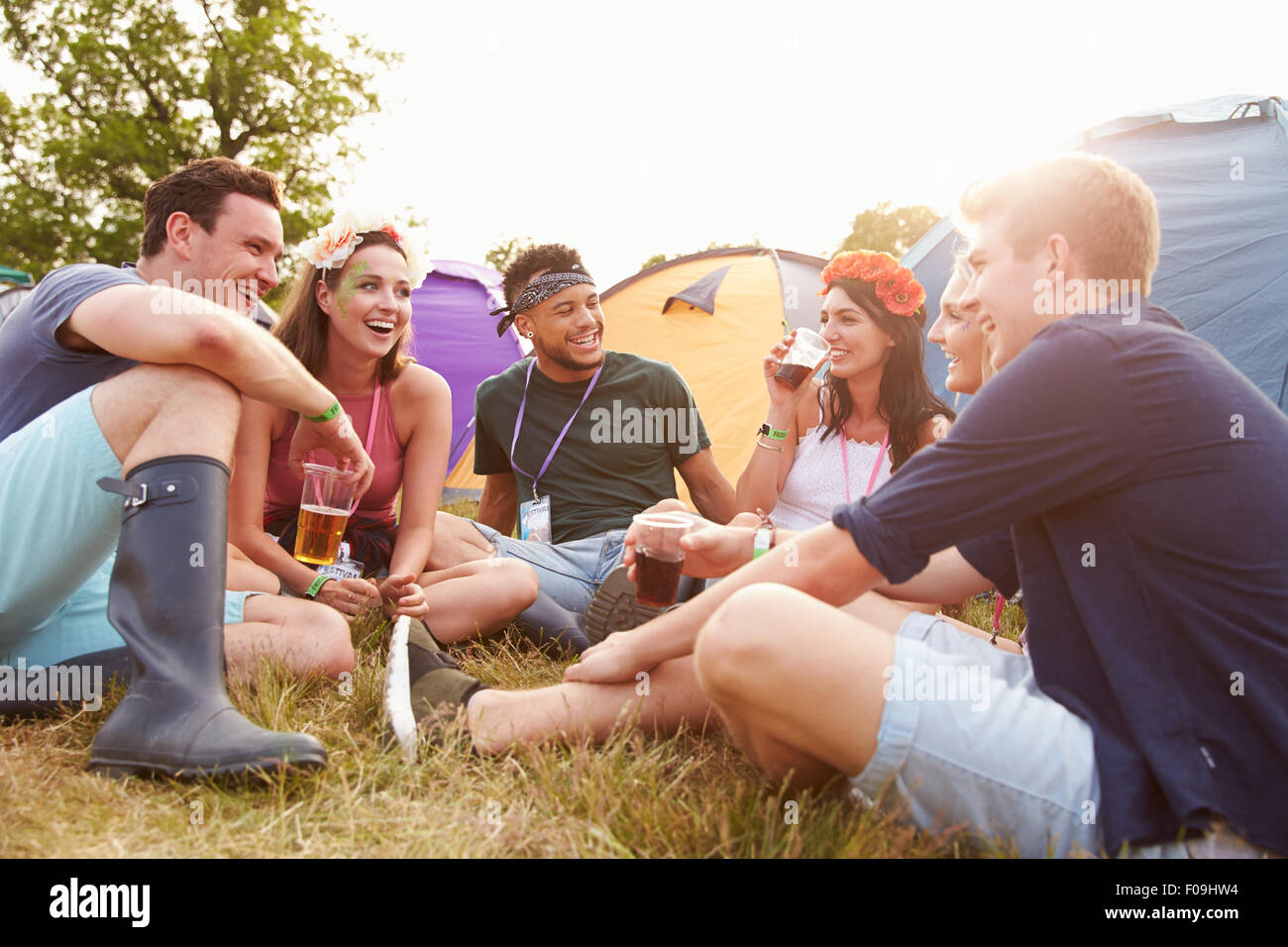 Friends having fun on the campsite at a music festival Stock Photo - Alamy