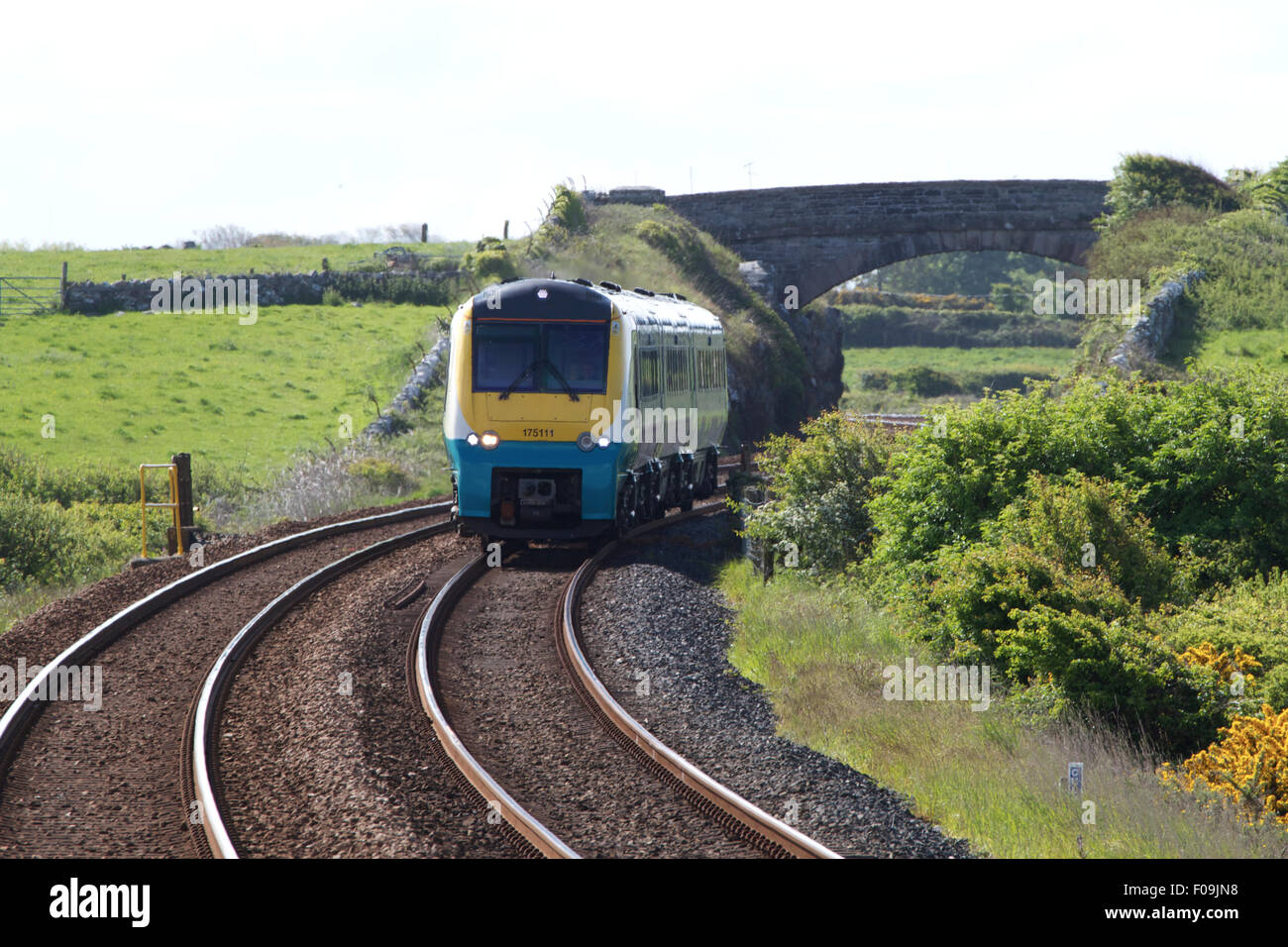 Train approaching Rhosneigr Station. Anglesey, Wales Stock Photo - Alamy