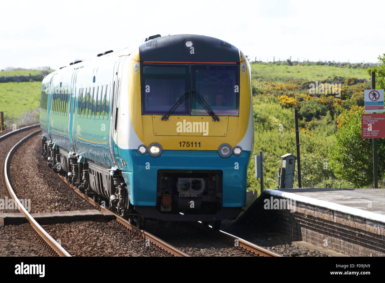 Train approaching Rhosneigr Station. Anglesey, Wales Stock Photo - Alamy