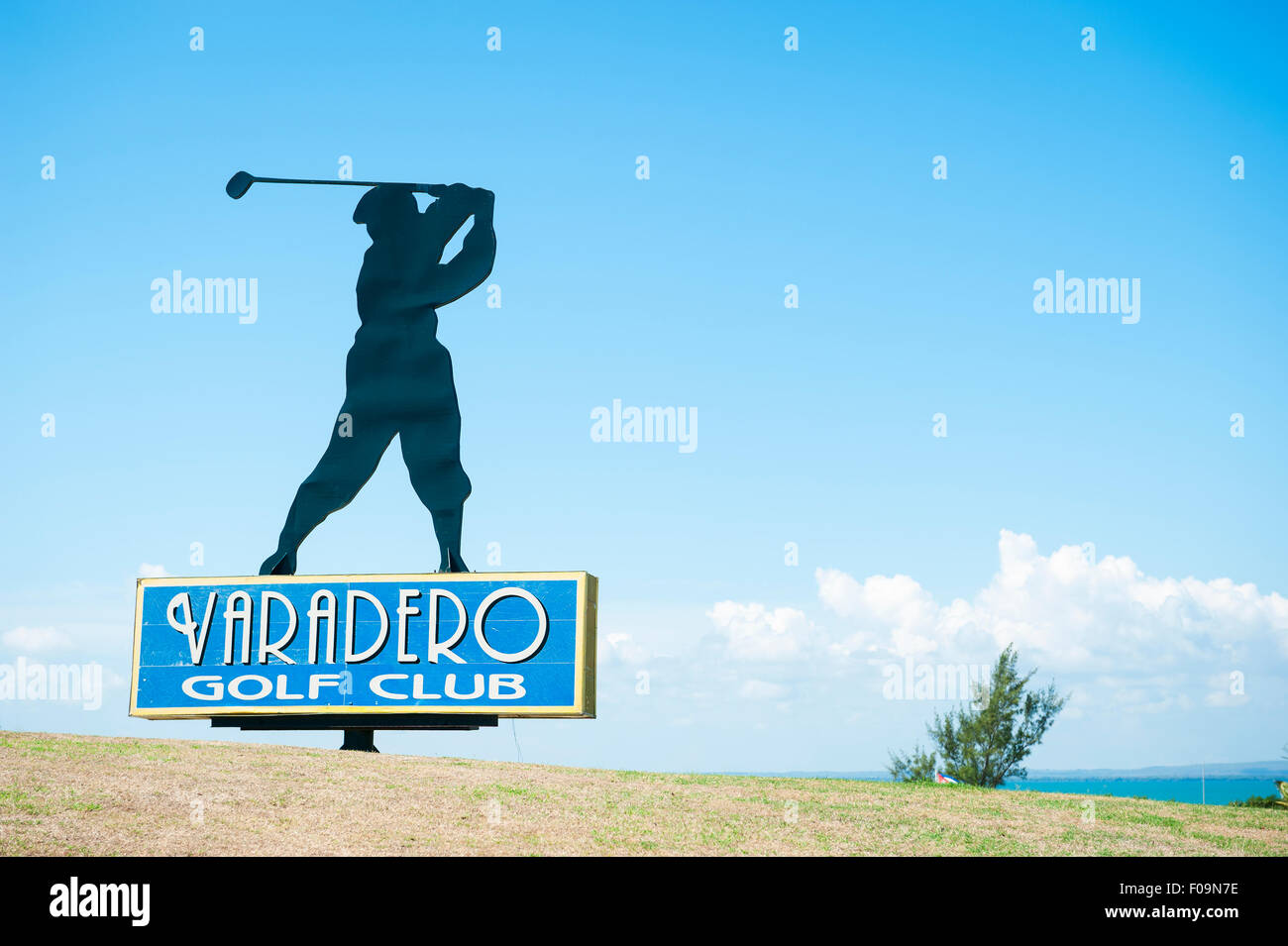VARADERO, CUBA - MAY 25, 2011: Silhouette of golfer stands atop a sign ...