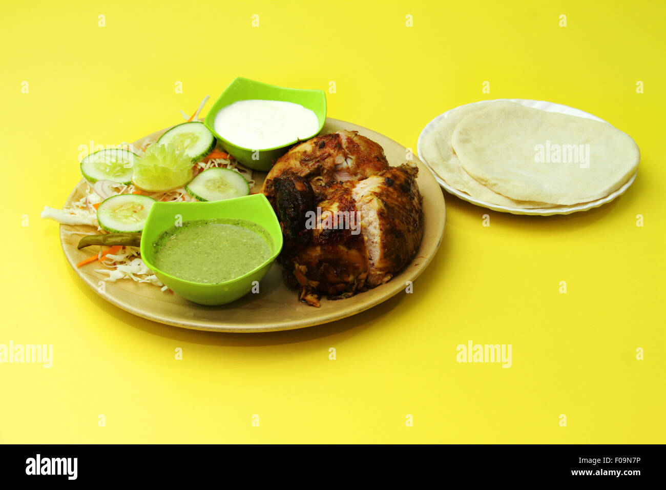 Full Chicken Shawai with Kuboos Stock Photo - Alamy