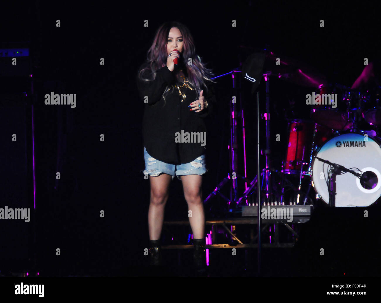 Taipei. 10th Aug, 2015. Singer A Mei performs during a relay concert in ...