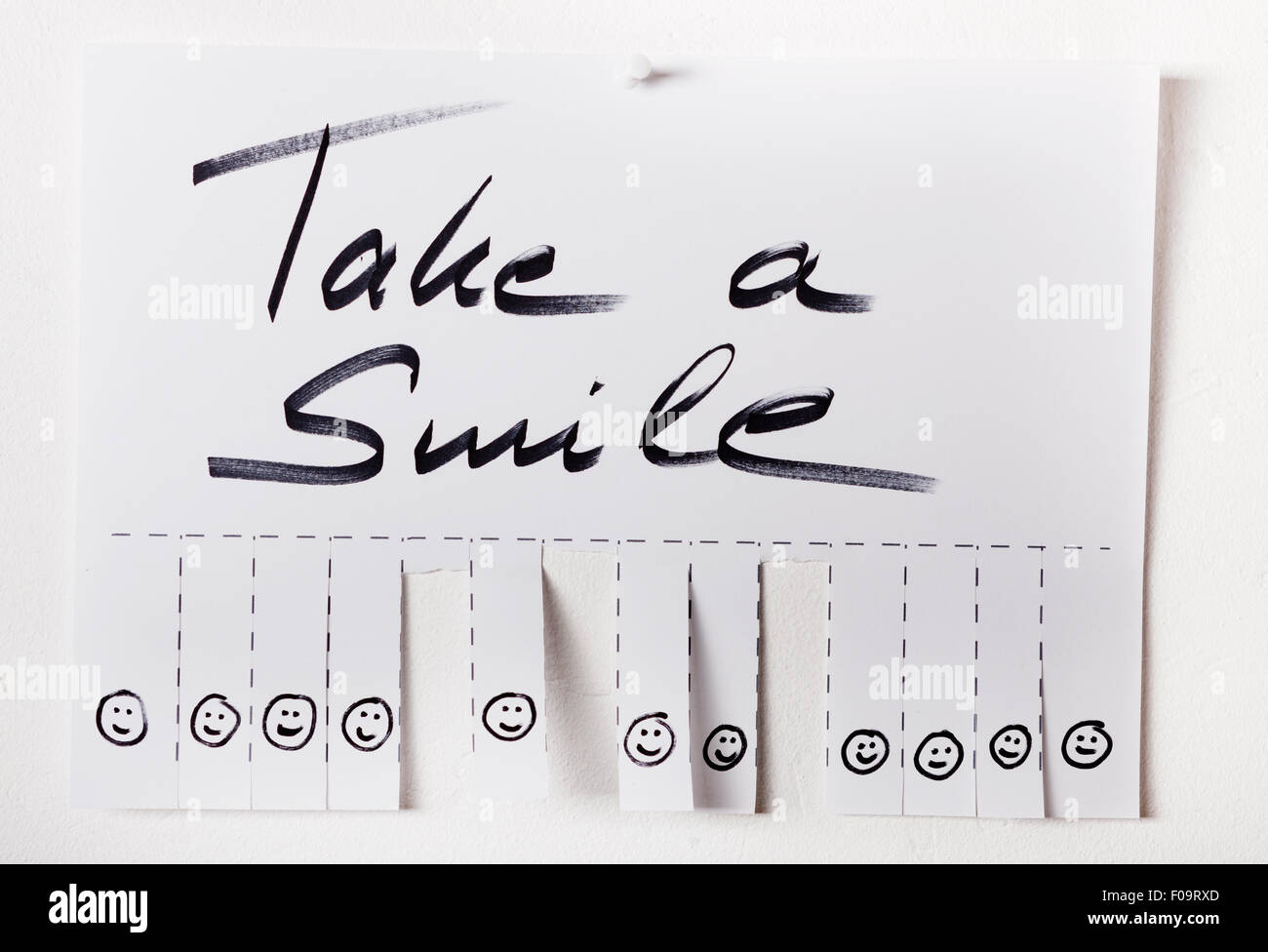 Take a Smile and be Happy Stock Photo - Alamy