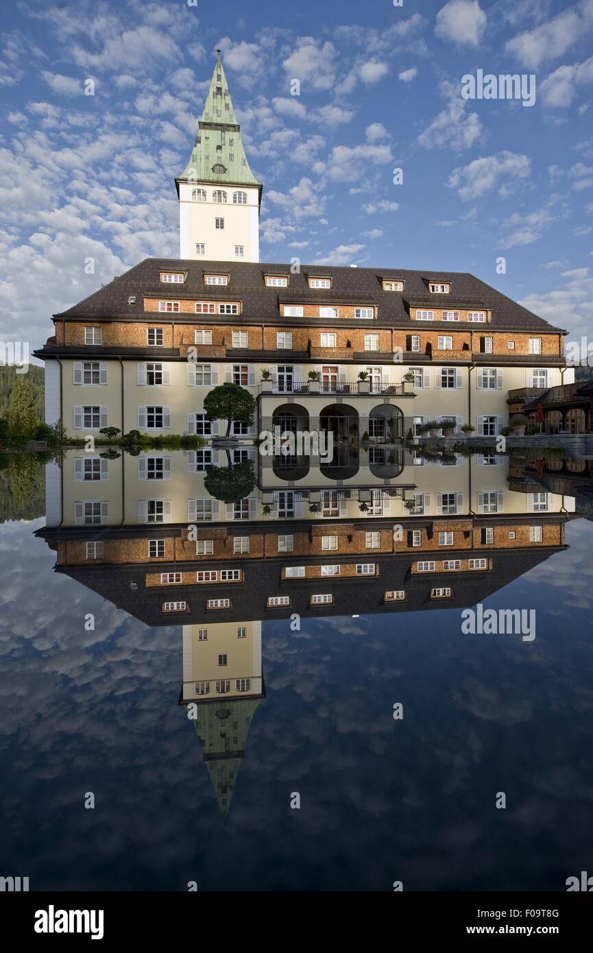 Hotel Schloss Elmau reflected in water, Upper Bavaria, Germany Stock ...