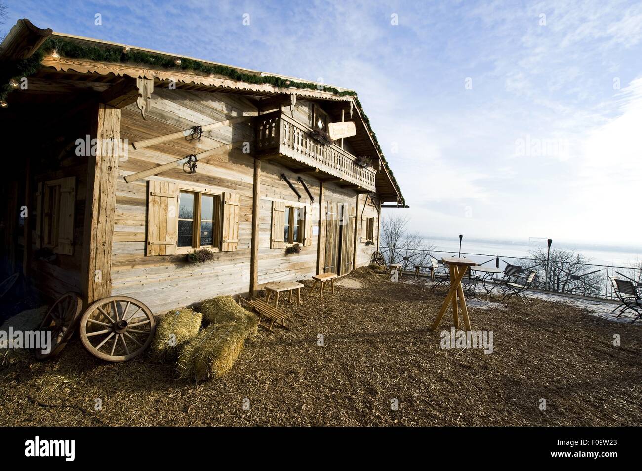 Couple sitting outside hut at Hamburg, Germany Stock Photo - Alamy
