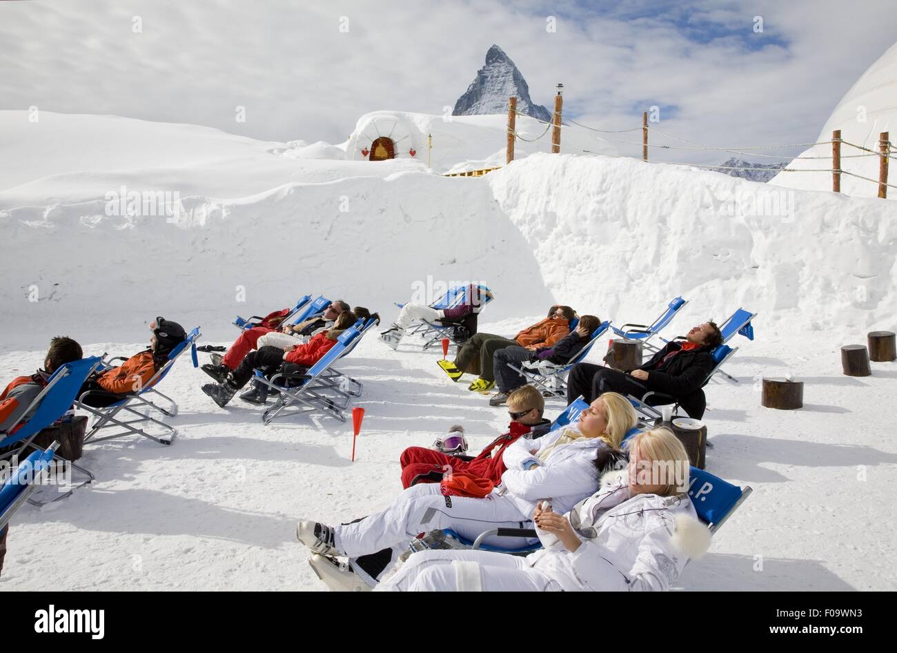 People having sunbath on Igloo village in Zermatt, Valais, Switzerland ...