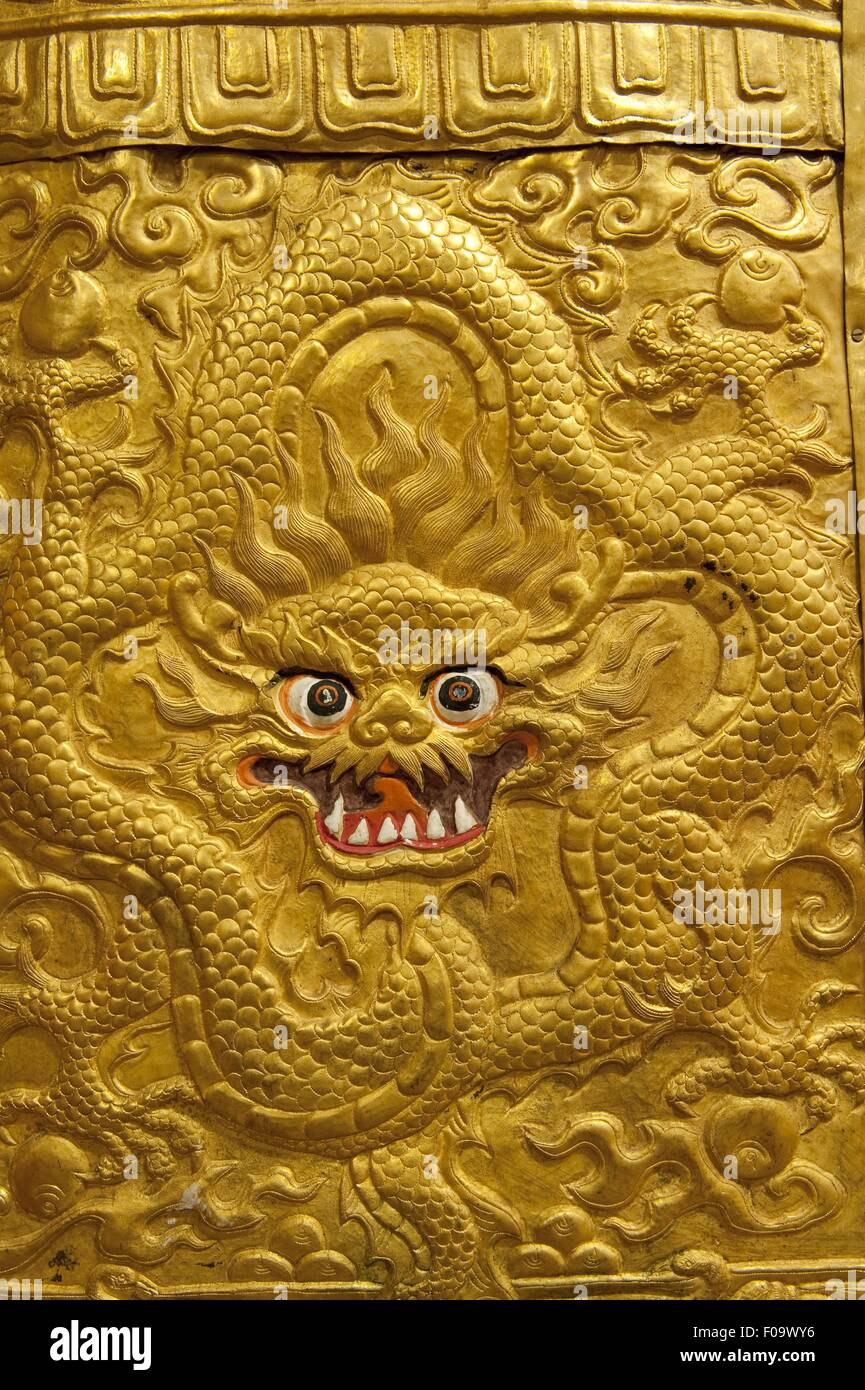 Close-up of monster carved on column at Punakha Dzong, Bhutan Stock ...