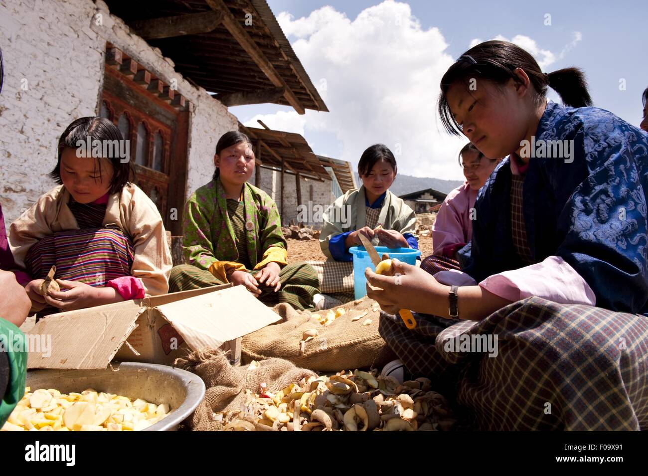 Women preparing food in school at Ura valley, Bhutan Stock Photo - Alamy