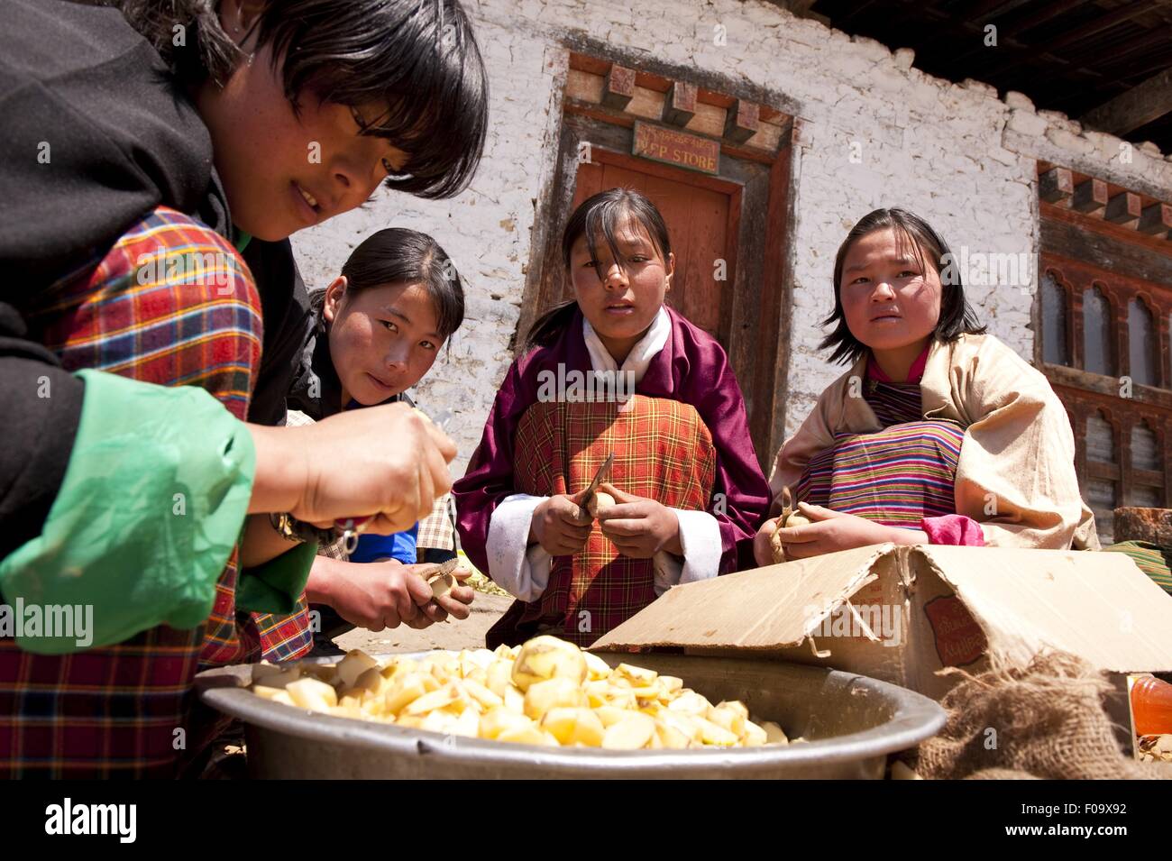 Women preparing food in school at Ura valley, Bhutan Stock Photo - Alamy