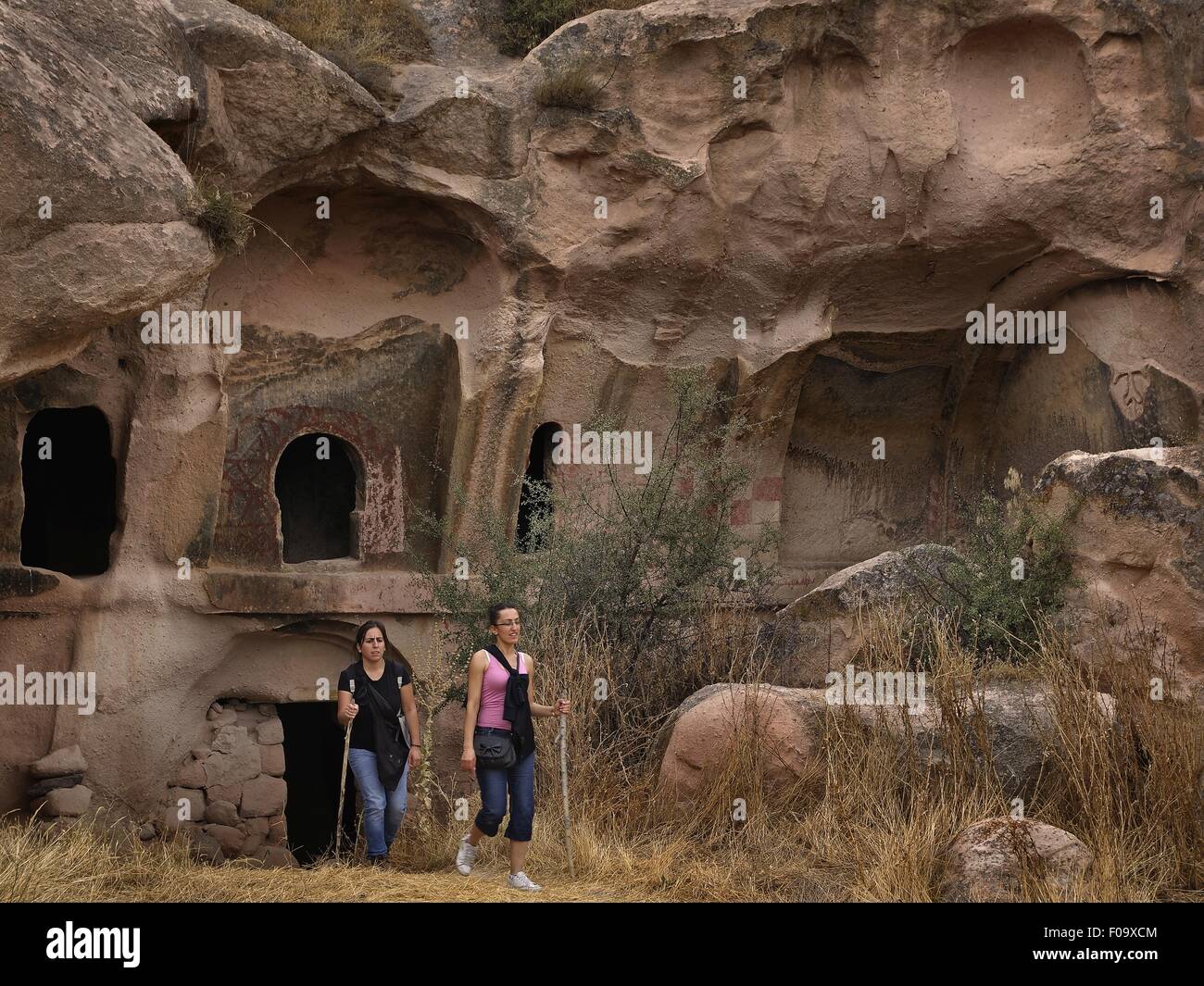 Tourist visiting Gulsehir Aciksaray at Cat Valley, Cappadocia, Turkey ...