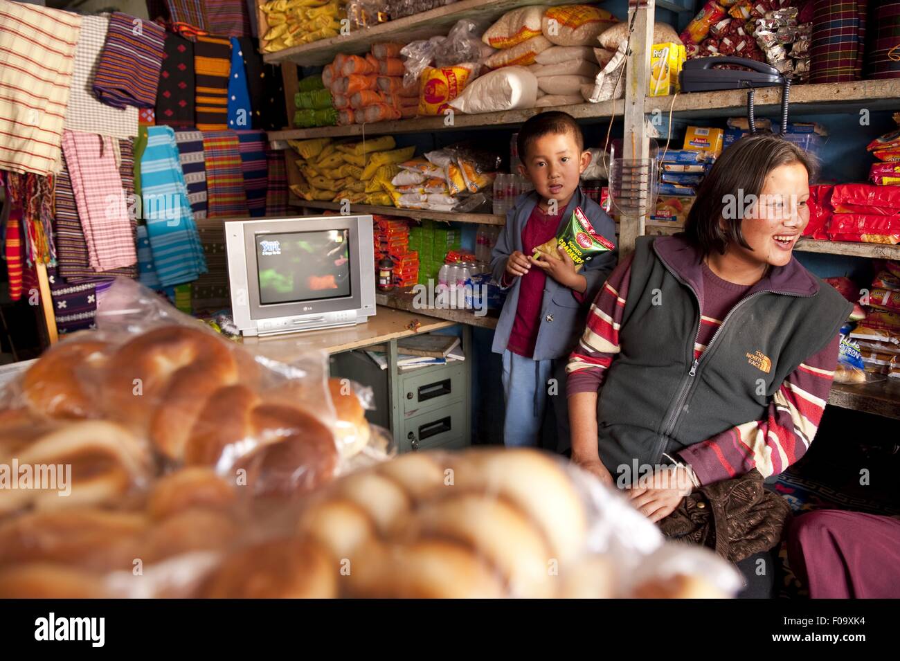 People in a shop in downtown at Paro, Bhutan Stock Photo - Alamy