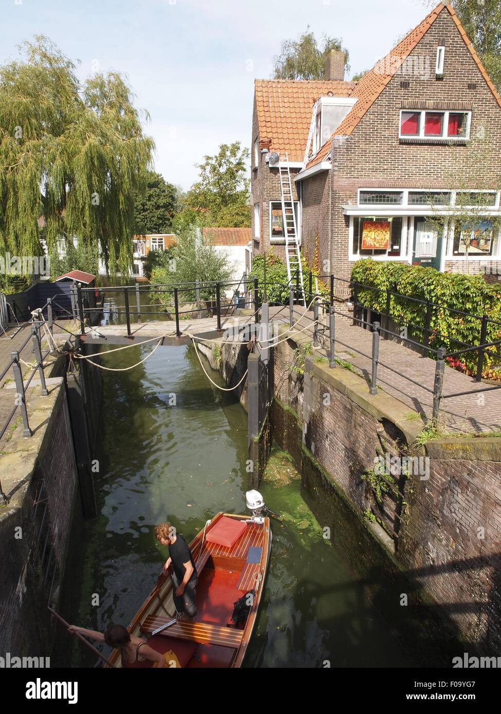 View of Cafe 't Sluisje and Sluice Channel, Noord, Amsterdam ...