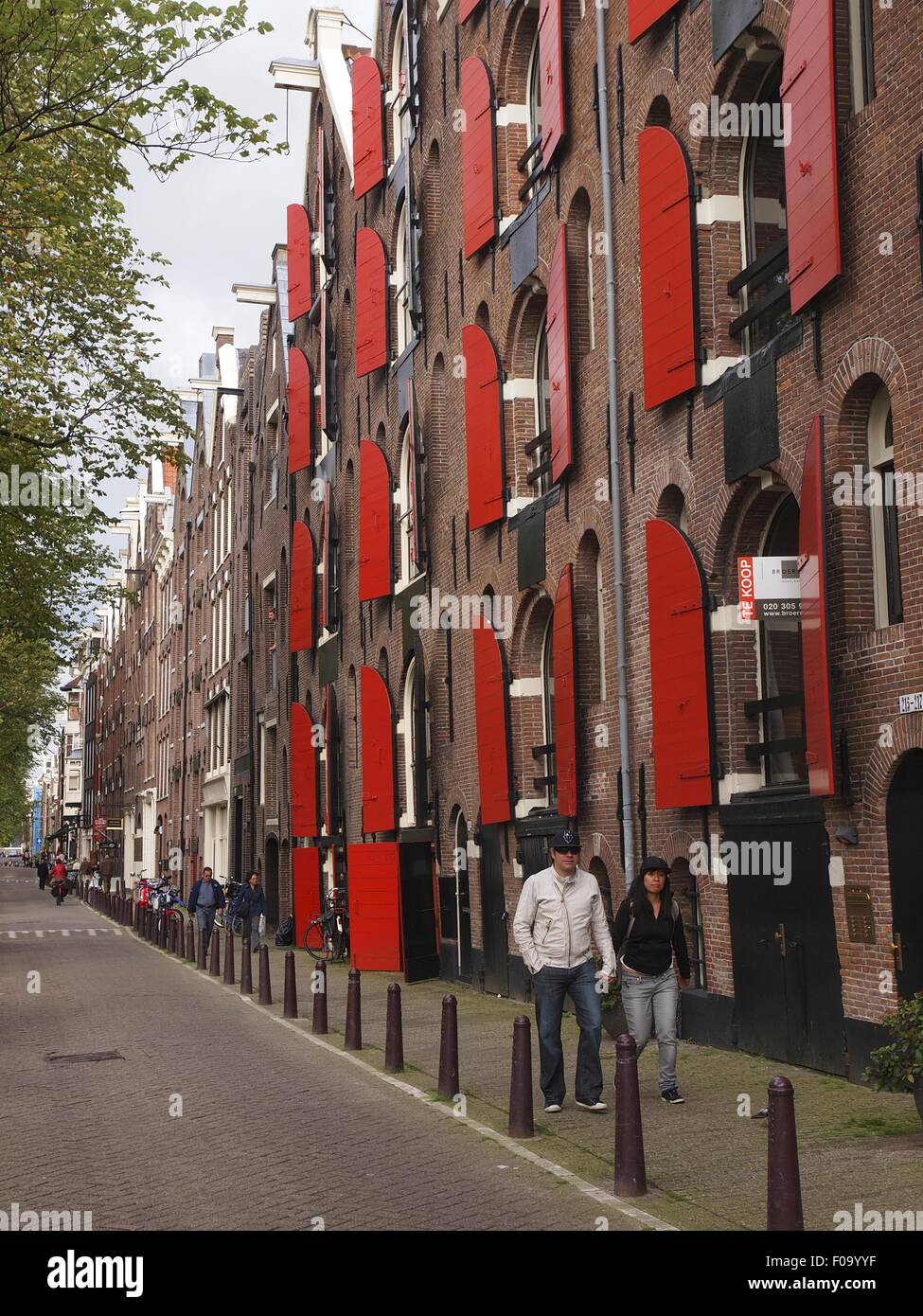 Row of houses with red shutters in Prinsengracht, Amsterdam ...