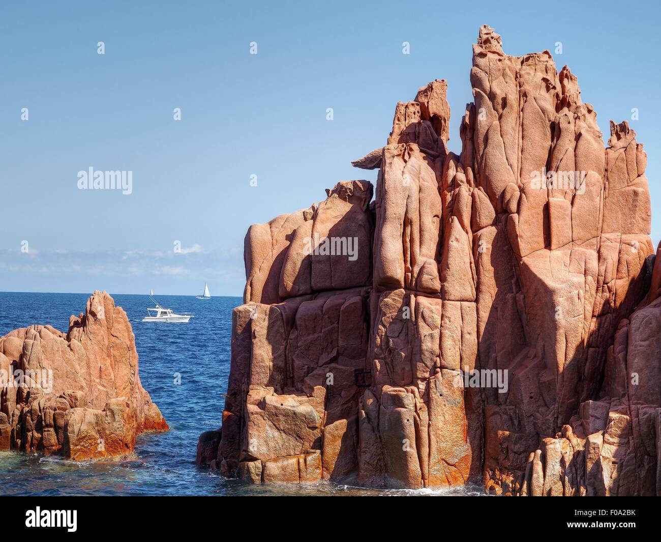 Red rocks at Rocce Rosse beach in Arbatax, Sardinia, Italy Stock Photo ...