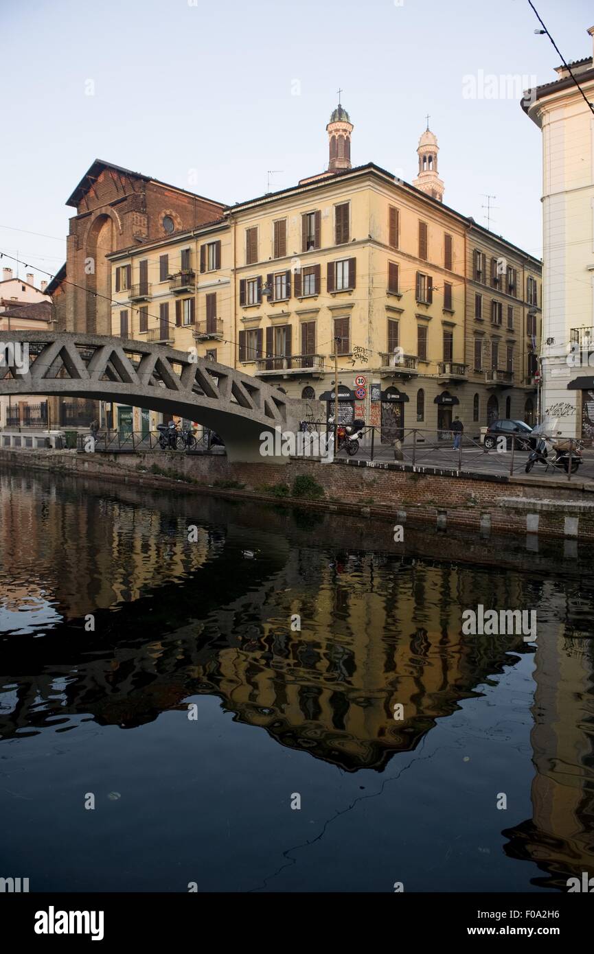 Navigli canal and bridge with building in Milan, Italy Stock Photo - Alamy