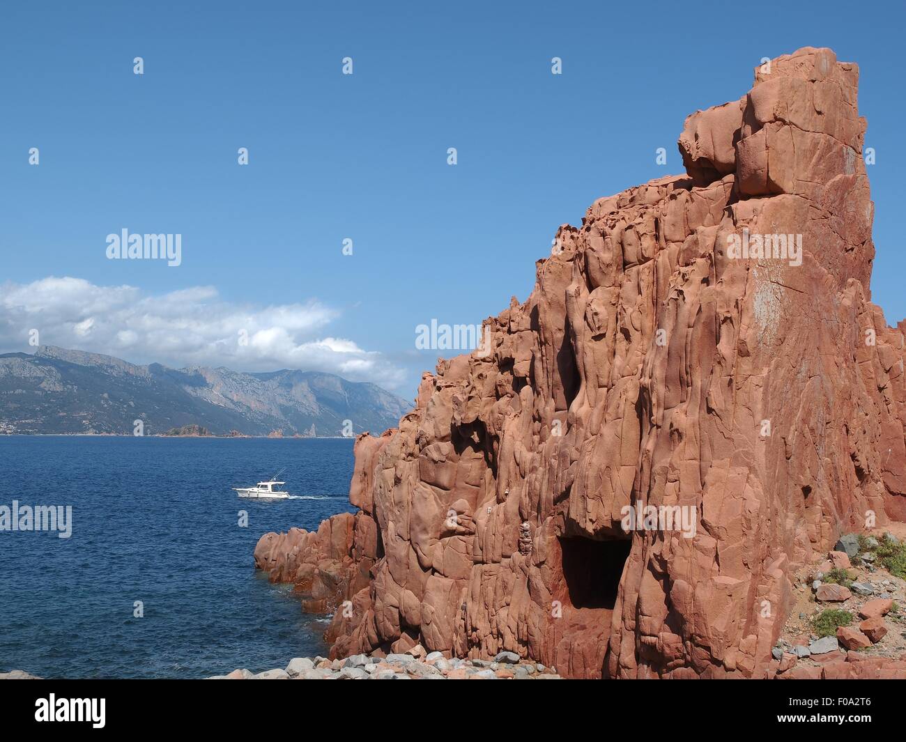 Red rocks at Rocce Rosse beach in Arbatax, Sardinia, Italy Stock Photo ...