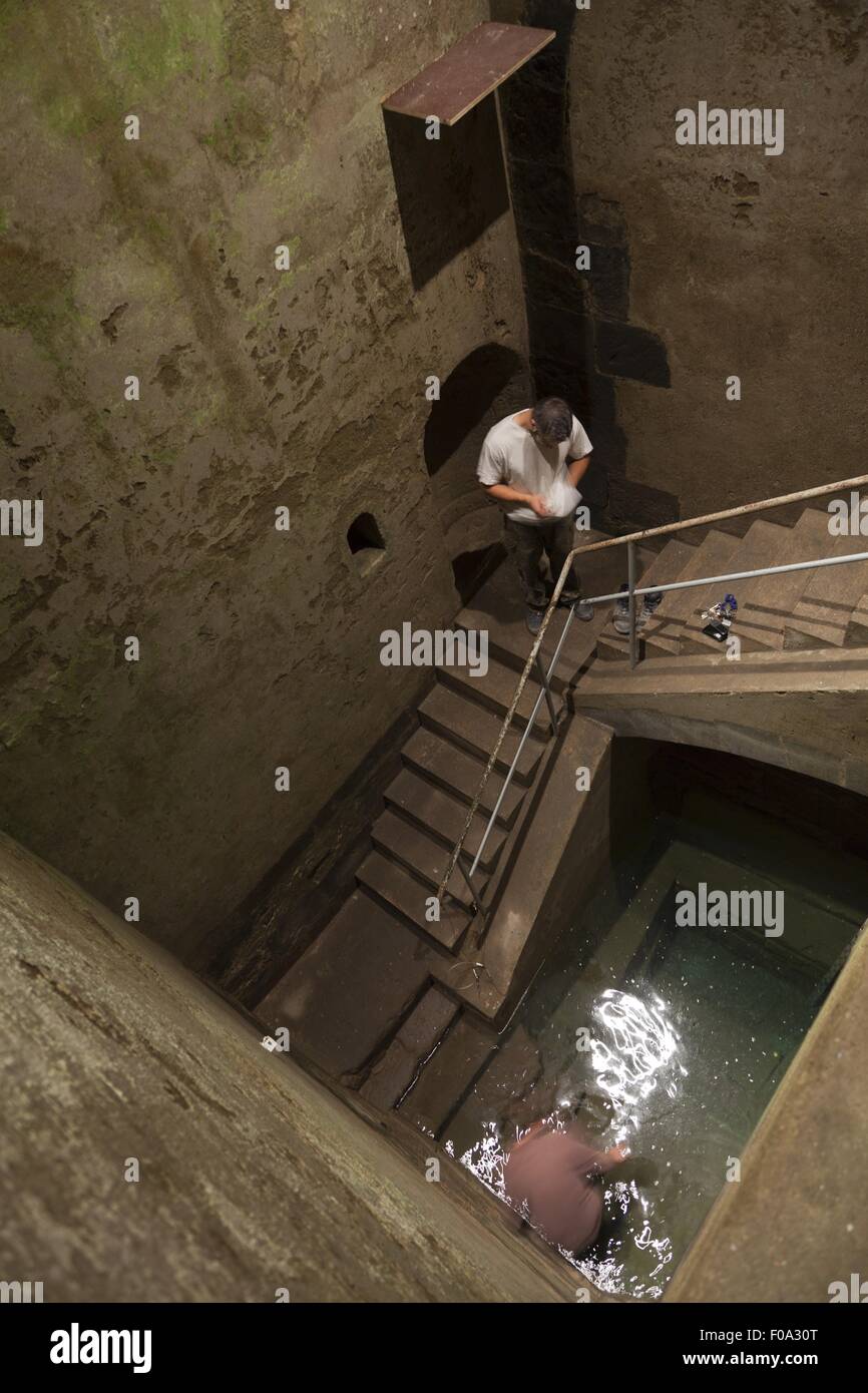 Two men in Mikveh in Archaeological Zone of Jewish Museum, Cologne ...