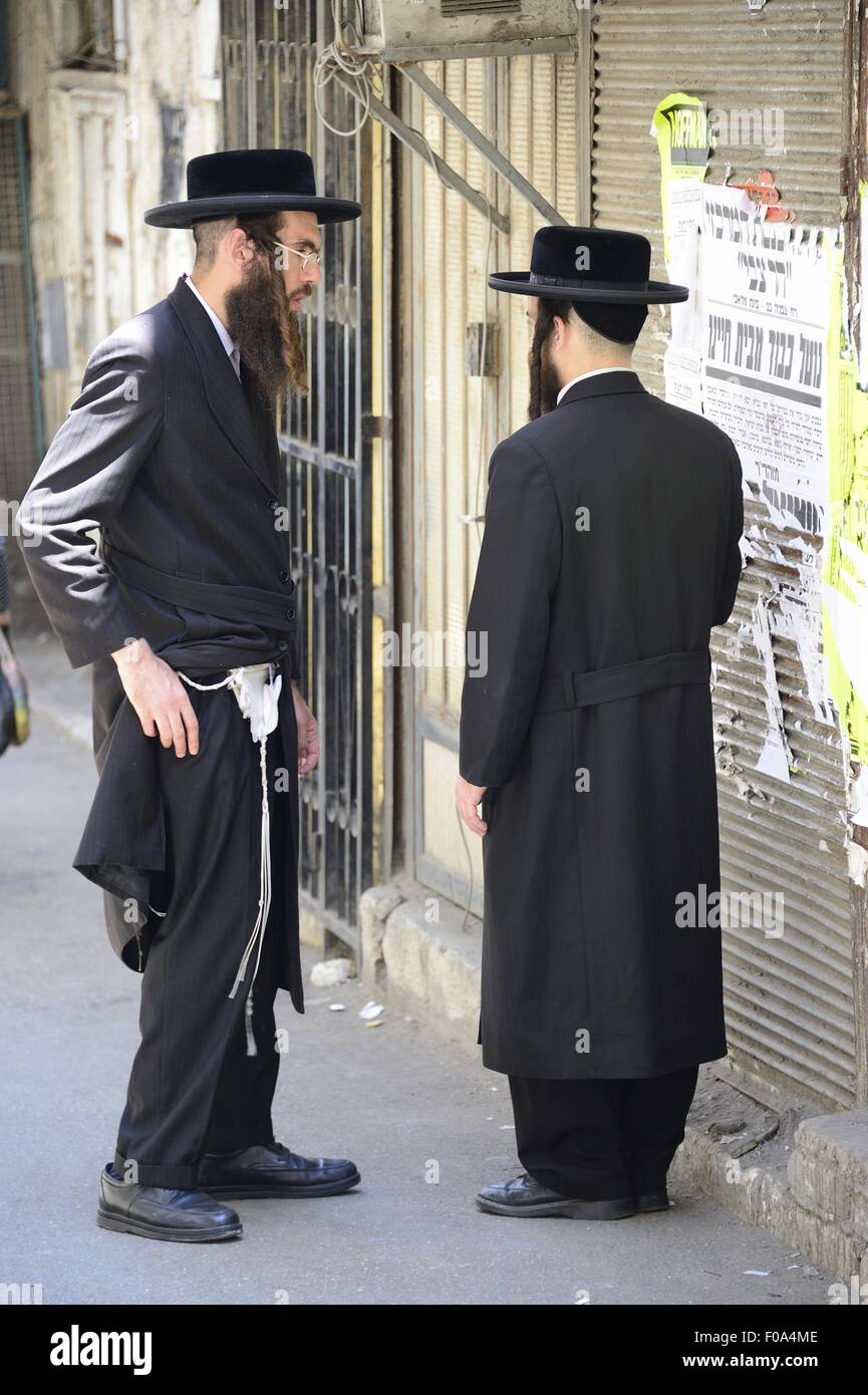Haredi men talking to each other on street at Mea Shearim, Jerusalem ...