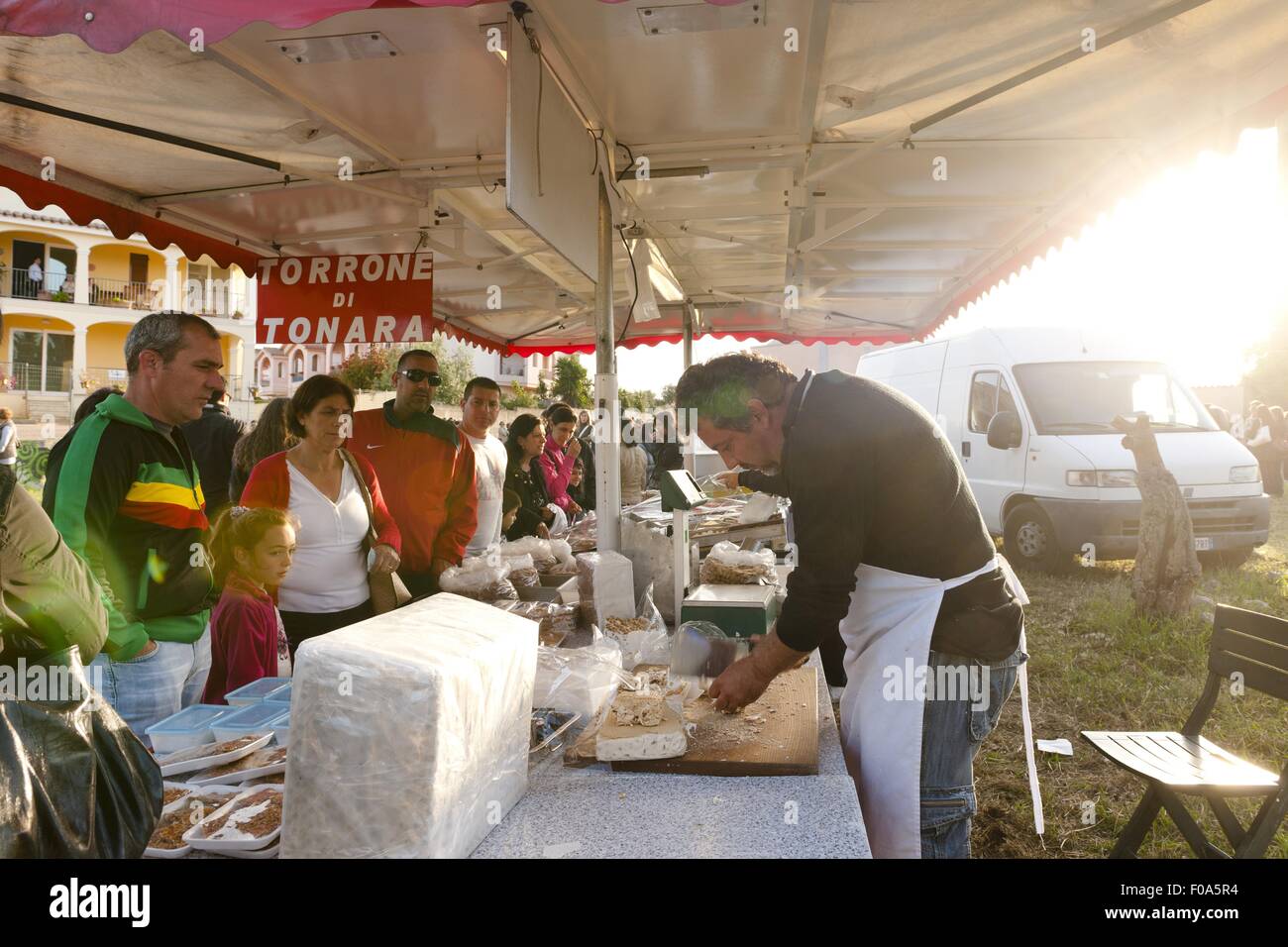 Seller selling Torrone in stall, Pula, Sardinia, Italy Stock Photo - Alamy