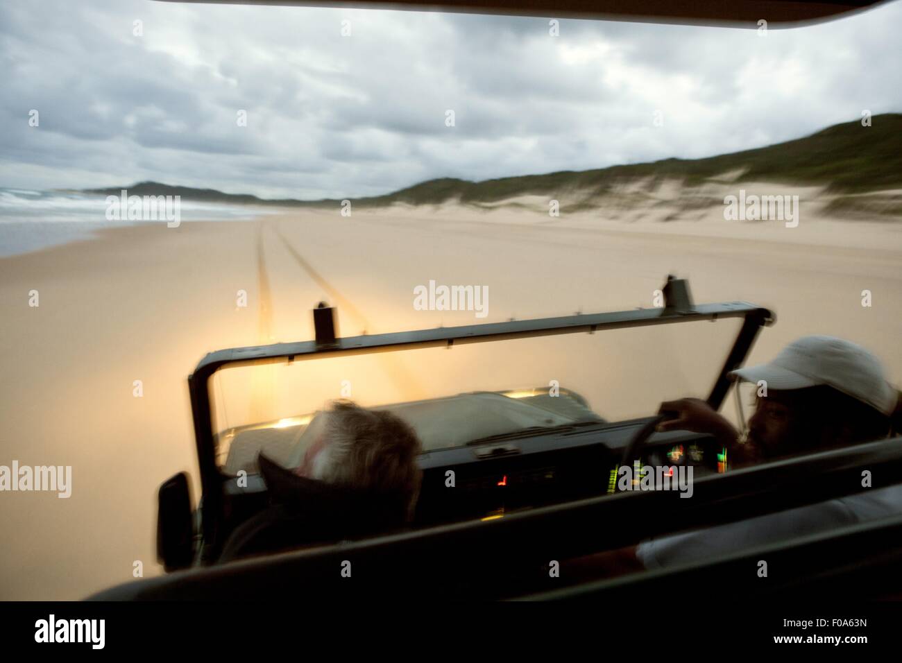 Maputaland Marine Reserve Jeep on the beach at dusk, South Africa Stock ...