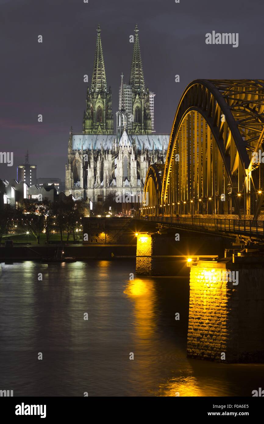 View of Cologne Cathedral and Hohenzollern Bridge at night, Cologne ...