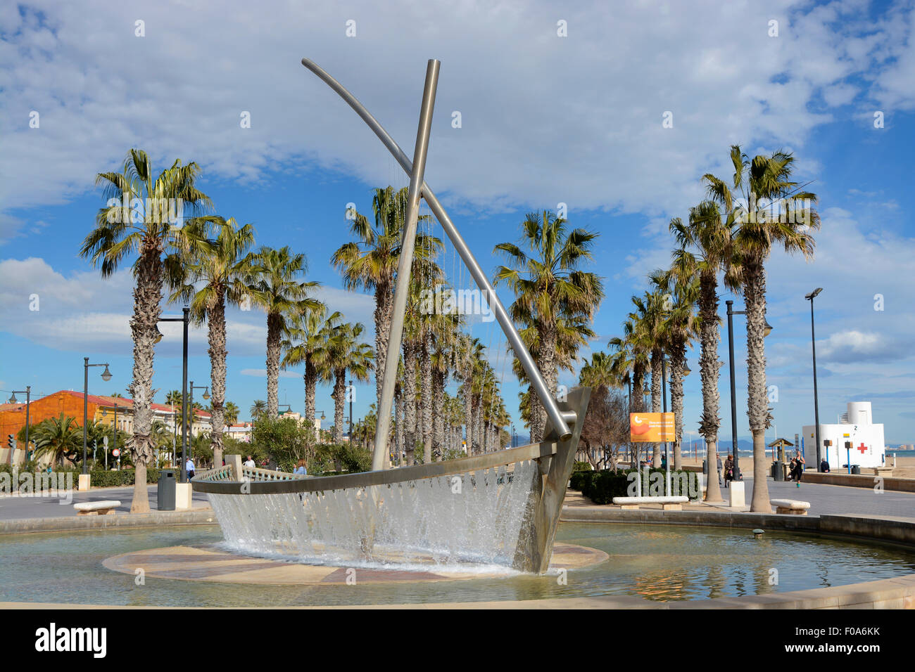 Fountain in shape of boat on the seafront promenade at Malvarossa beach ...