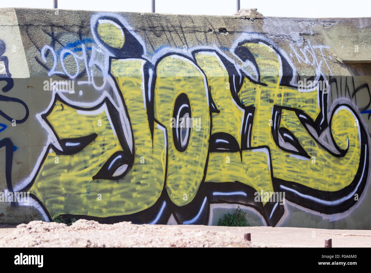 graffiti all over green walls of an abandoned military base near San ...