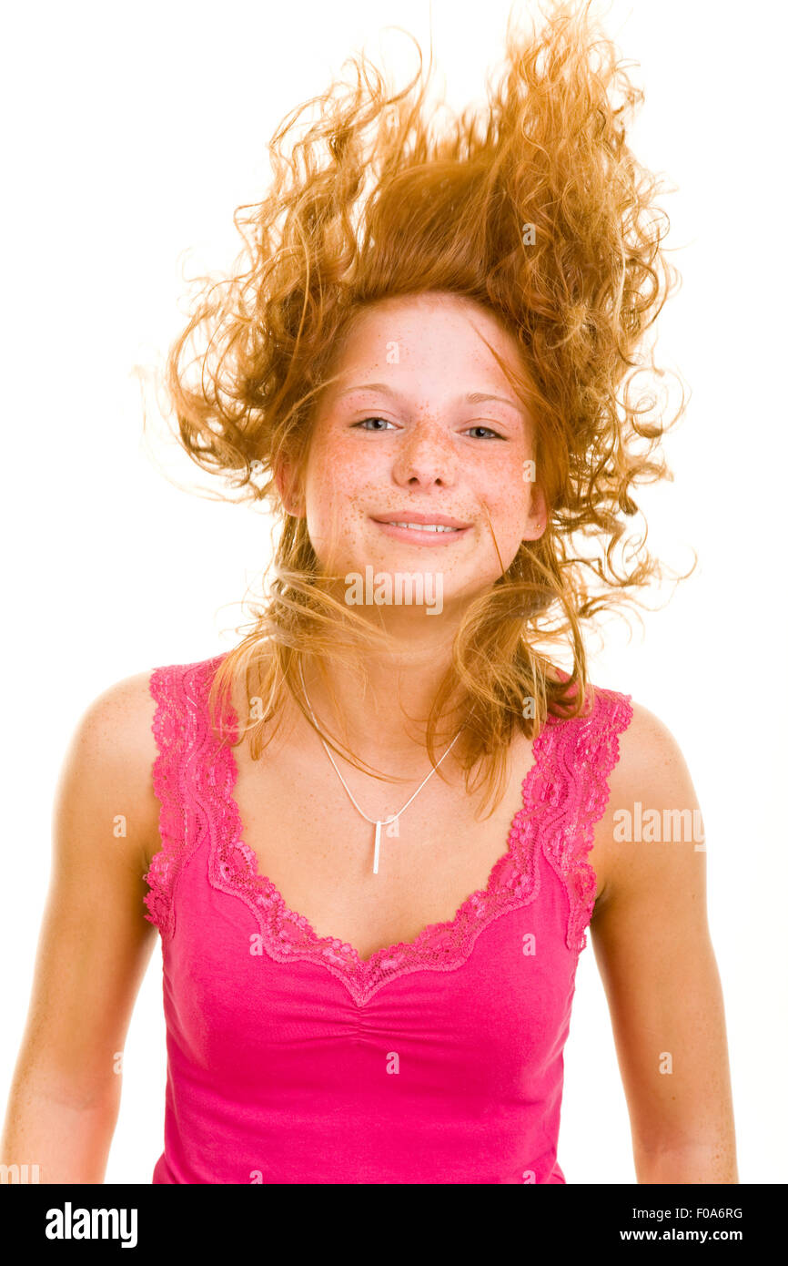 Young happy redhaired woman shaking her head Stock Photo - Alamy