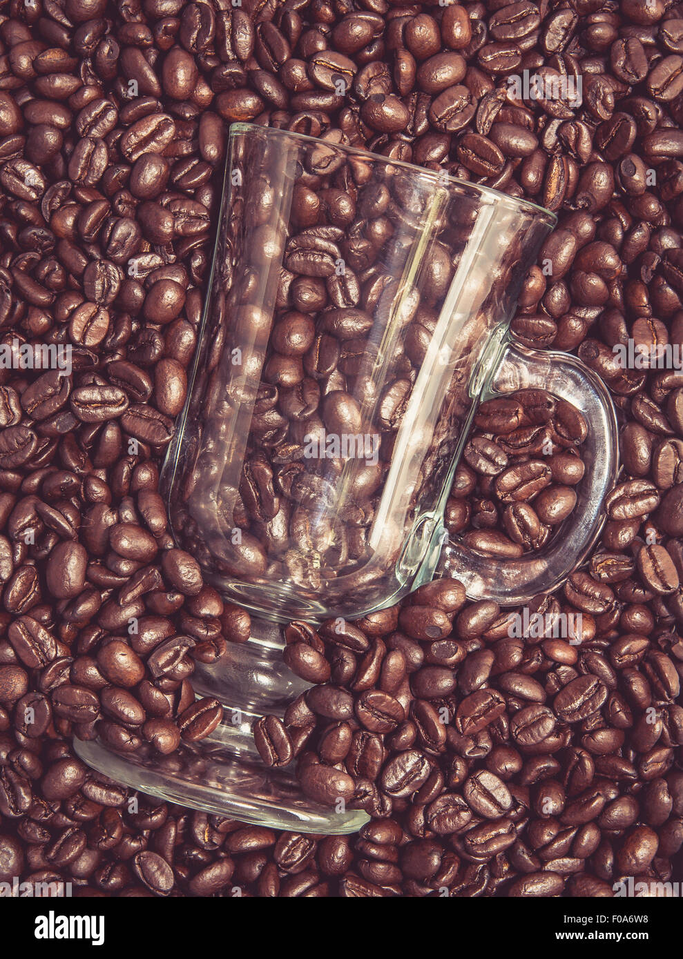 Irish coffee glass stuck in fresh coffee beans Stock Photo - Alamy
