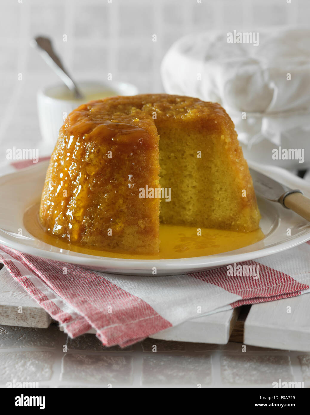 Steamed syrup pudding. Steamed treacle sponge. UK dessert Stock Photo ...