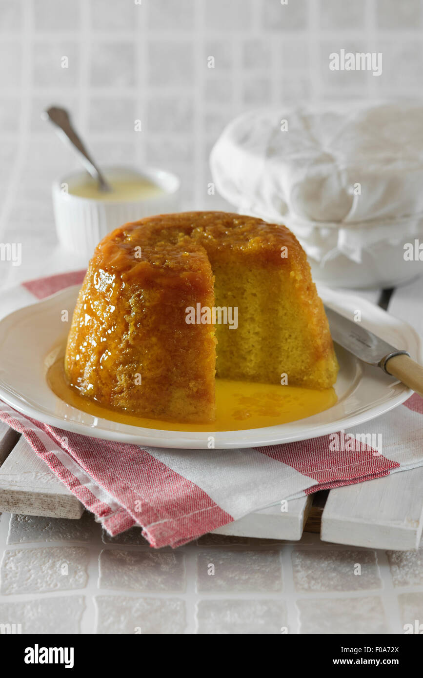 Steamed syrup pudding. Steamed treacle sponge. UK dessert Stock Photo ...