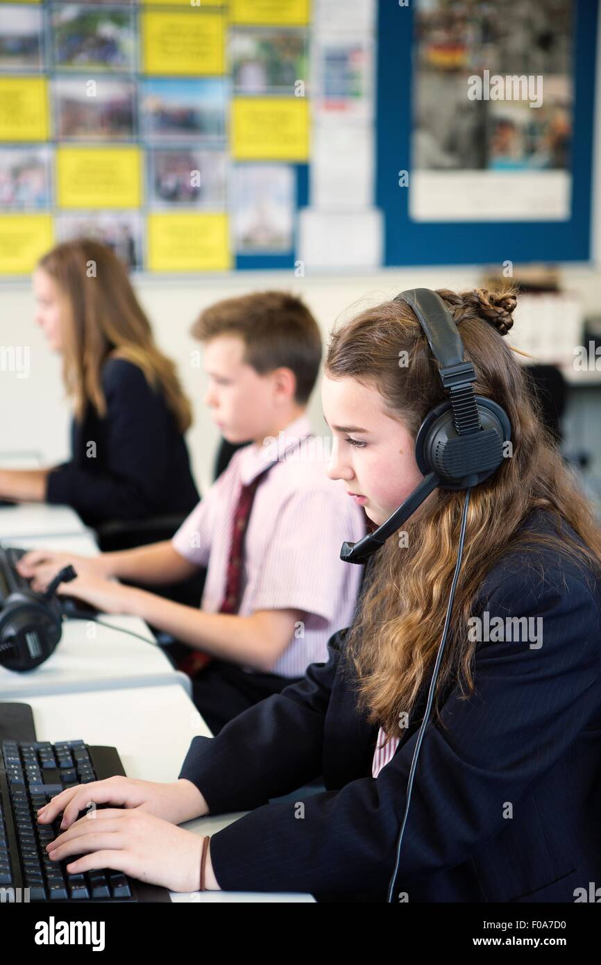 Students using computer in classroom Stock Photo - Alamy
