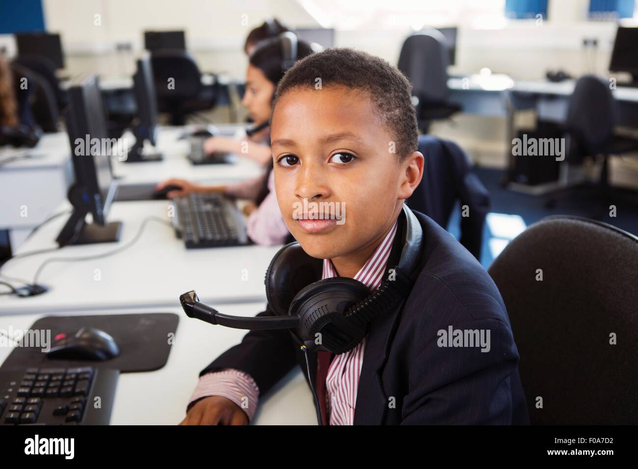 Students using computer in classroom Stock Photo - Alamy