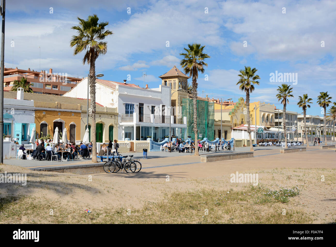 Restaurants, cafes and bars on seafront promenade at Malvarossa beach ...