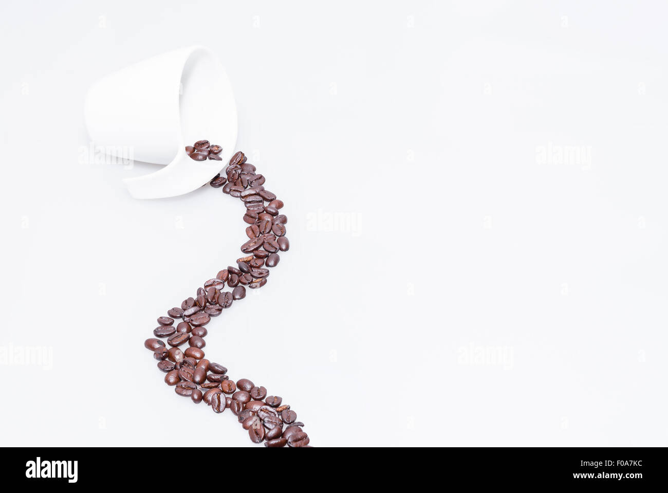 Coffee beans path that goes into the coffee cup Stock Photo - Alamy