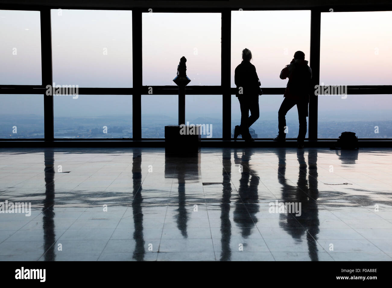 Two people enjoying the view from the observation deck of the Carlton ...