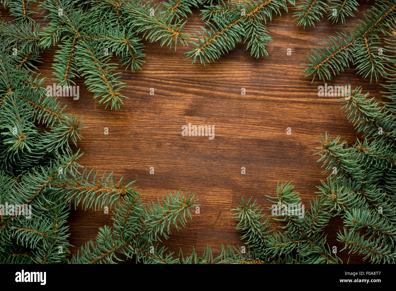 fir tree on wooden board background with copy space Stock Photo - Alamy