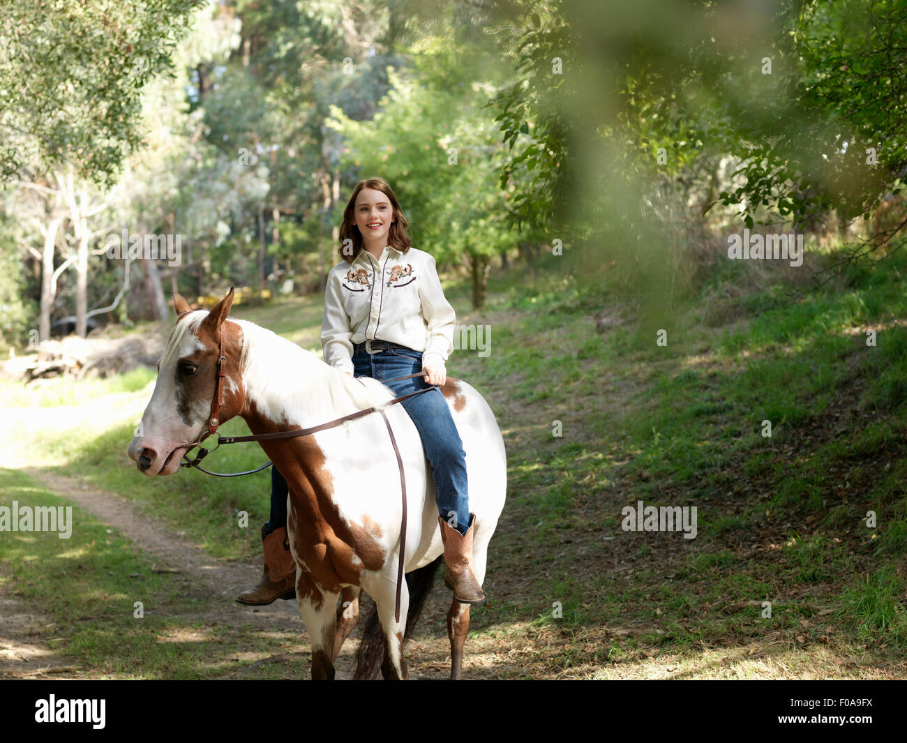 Portrait of teenage girl bareback riding horse Stock Photo - Alamy